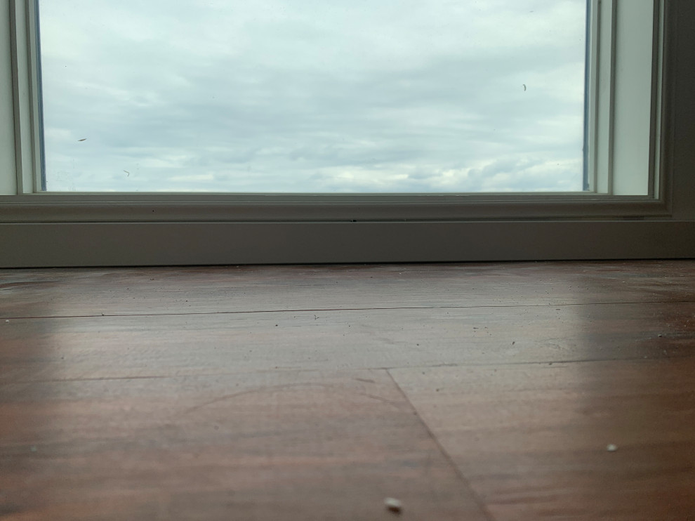 Uneven window wall and putting baseboard need help