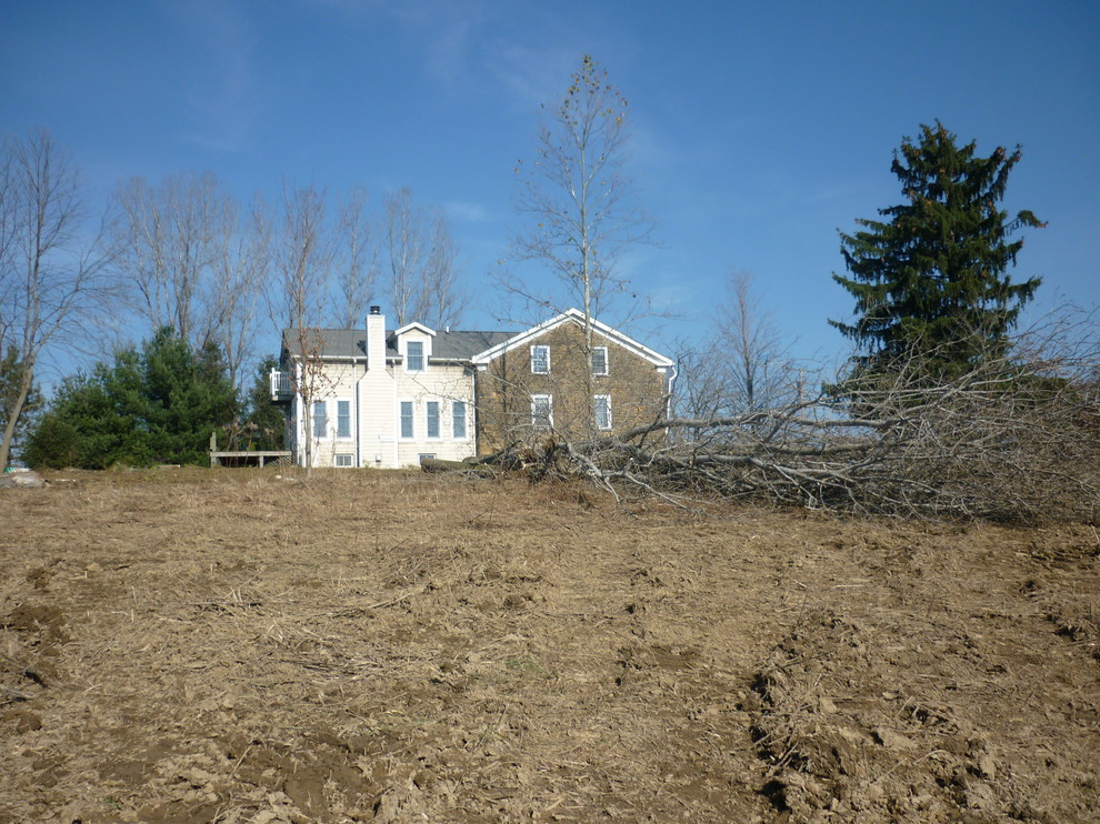 Lanscaping 1815 sandstone home front and backyard