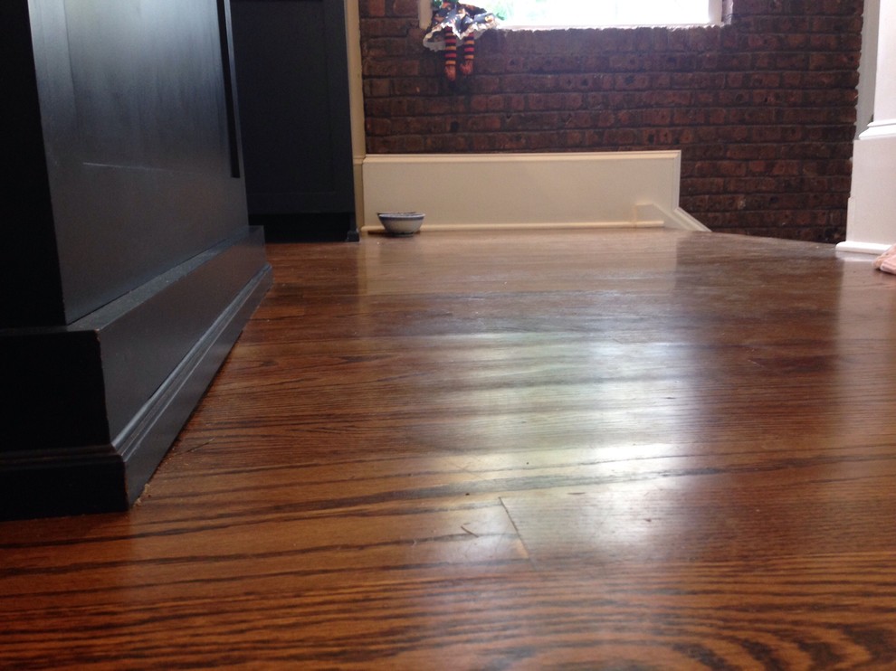 Newly installed warping wood floor?