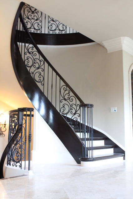 Curved staircase, metal panel railing - Traditional - Staircase ...