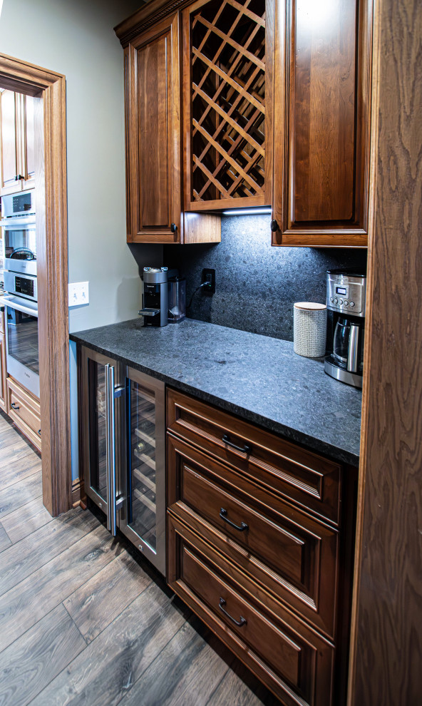 Reconfigured kitchen with new islands, countertops, backsplash ...