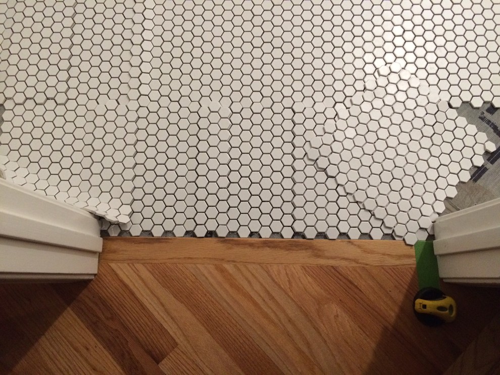 Laying 1in Hexagon tile in a bathroom with odd angles.