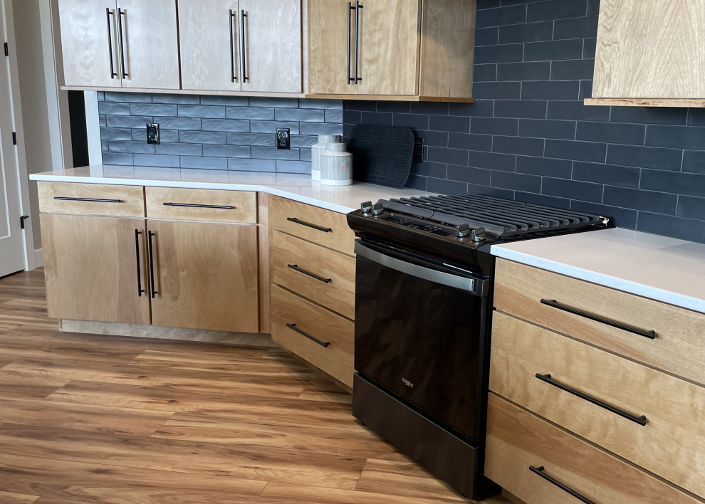 Angled Kitchen Design with Slab Style Cabinets in Pecan Stain ...