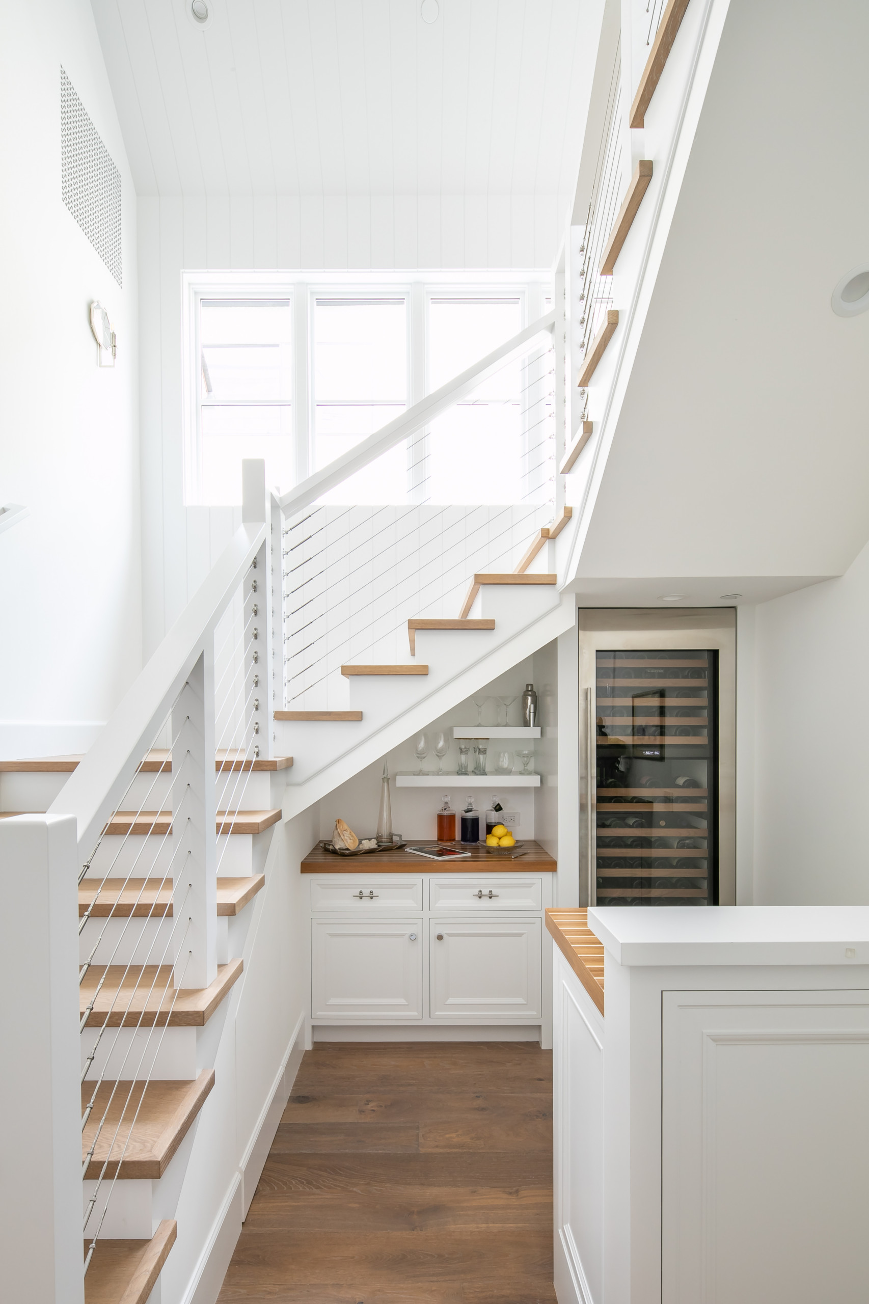 25 Home Bars Stashed Under the Stairs