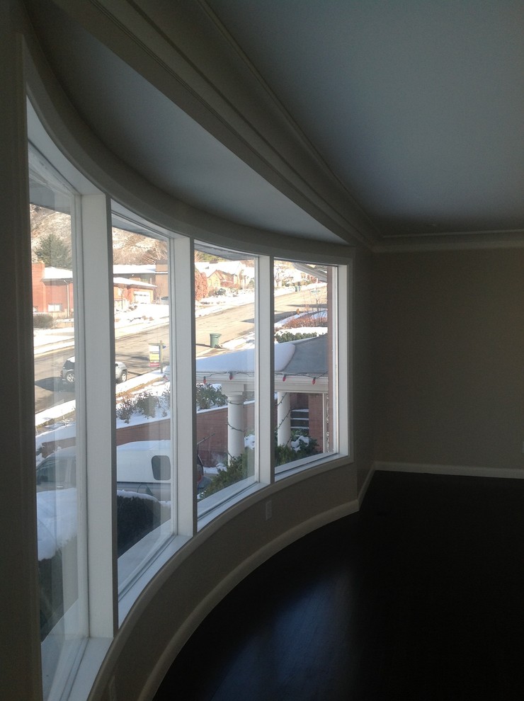Need help with window treatments for a large bow window