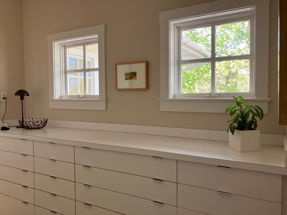 ideas how to make this countertop look better? Windows not centered.