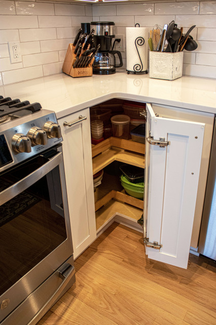 Siteline White Kitchen with Gray Island and Calacatta Miraggio Quartz ...