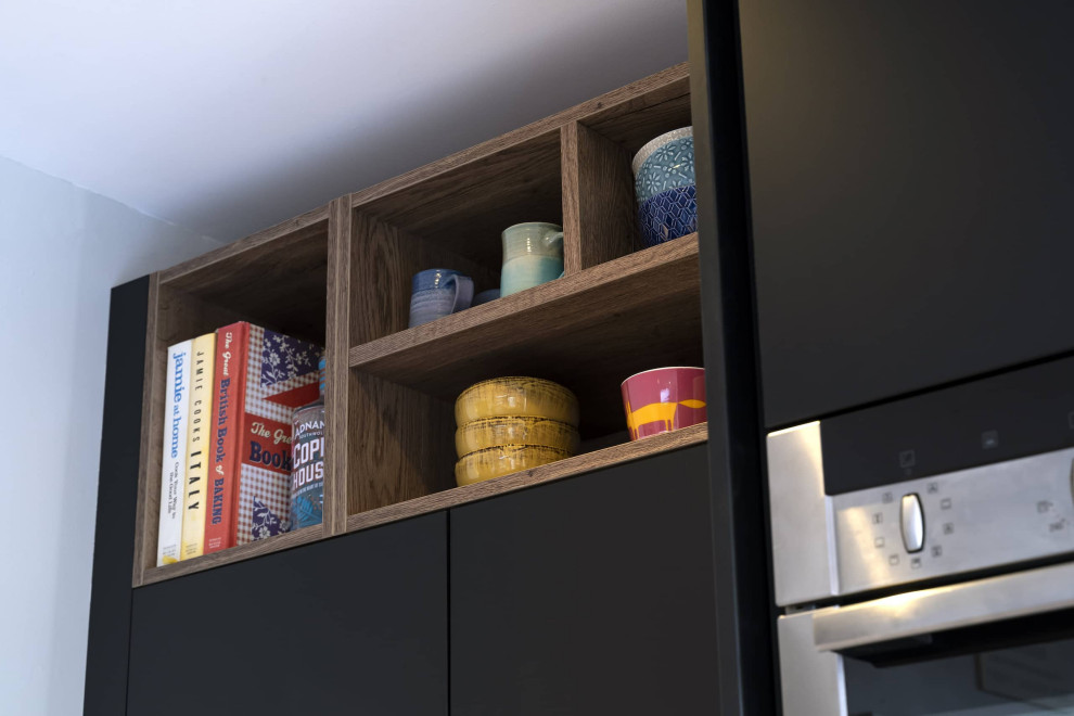 Black handleless kitchen with black marble worktop - Kitchen ...