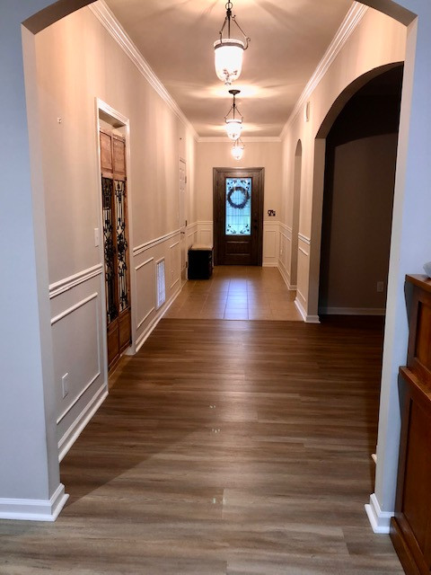 How to transition paint colors with open plan and archways? Yikes!