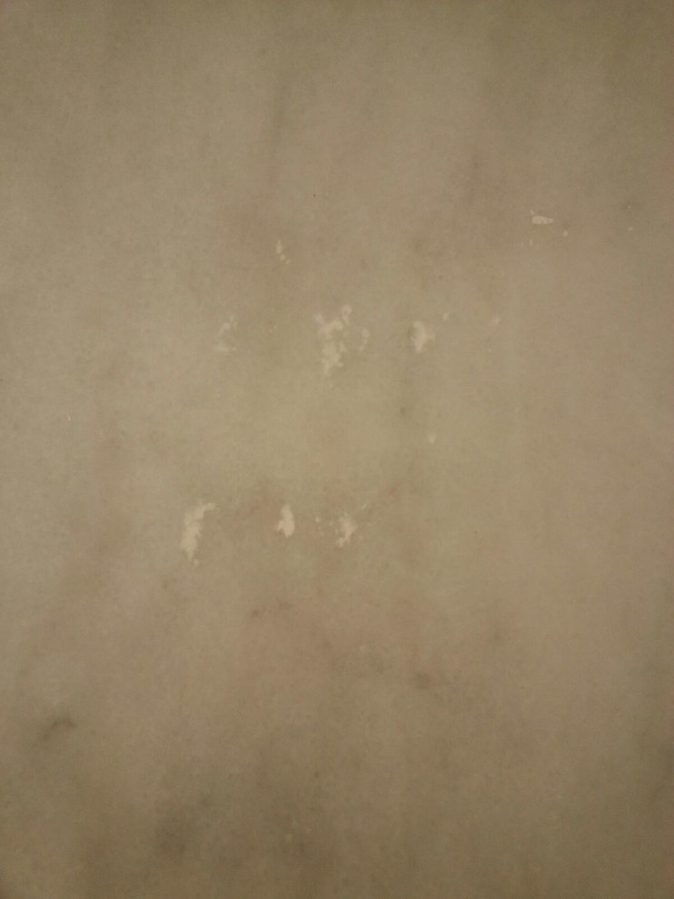 Brand new marble countertops have pitting!