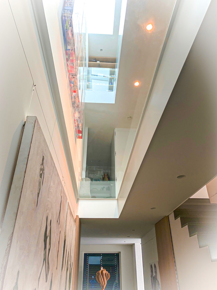 Double volume ceiling in hallway entrance - Contemporary - Hall - by ...