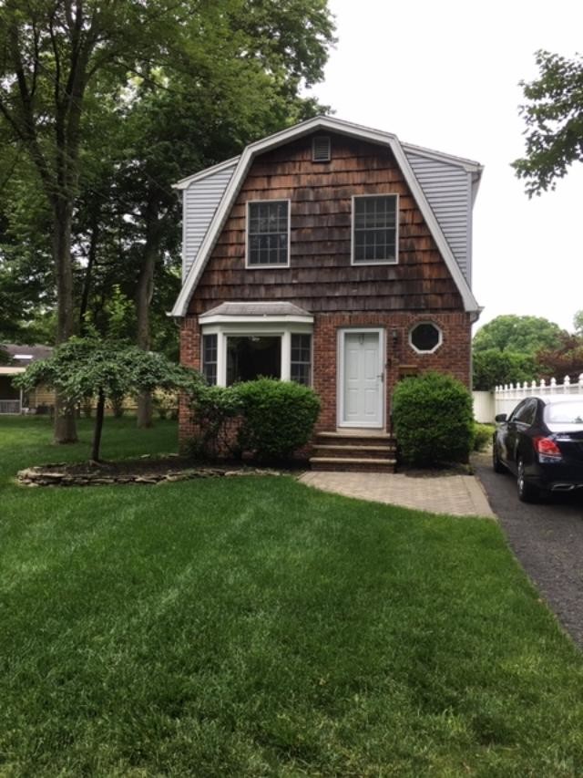 Looking for ideas to update/remodel 80's home exterior