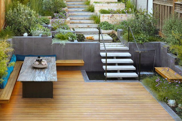 Outdoor Rooms and Stylish Plantings Tame a Hilly Lot