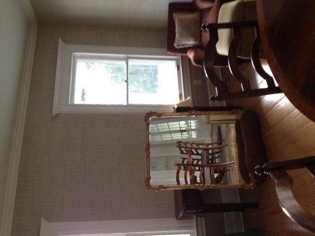 How high should I hang a formal mirror over a sideboard/buffet?