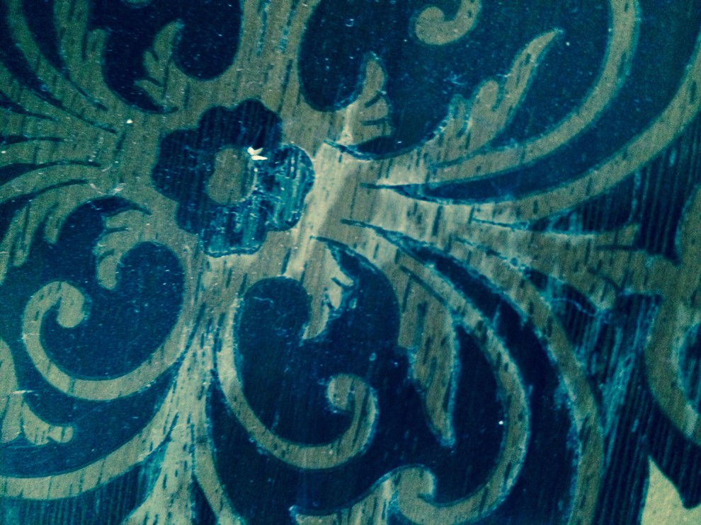 Varnish cracking and brittle on table with Inlay work