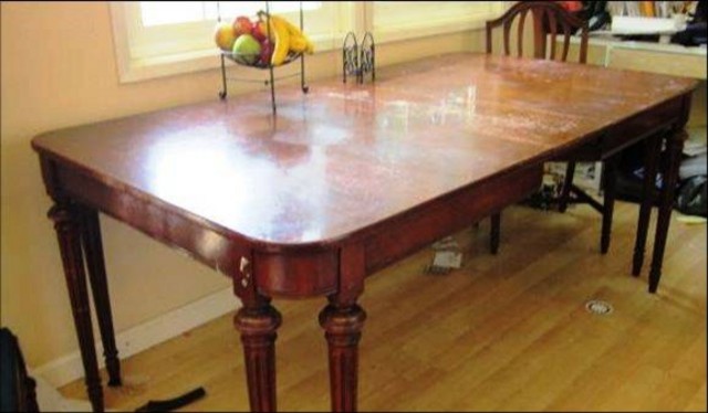 Can this table be 'saved'? I think it's chipped wood veneer.