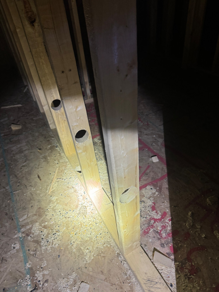 Is this Normal, Large holes in studs for plumbing.