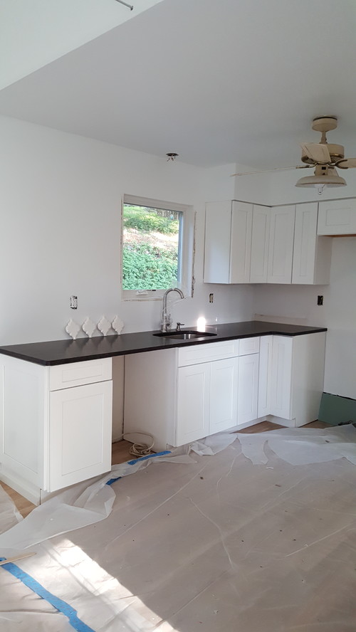 Granite counter installed with shims - problem?