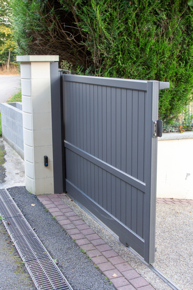 Installation d'un portail coulissant à double refoulement Split Sliders ...