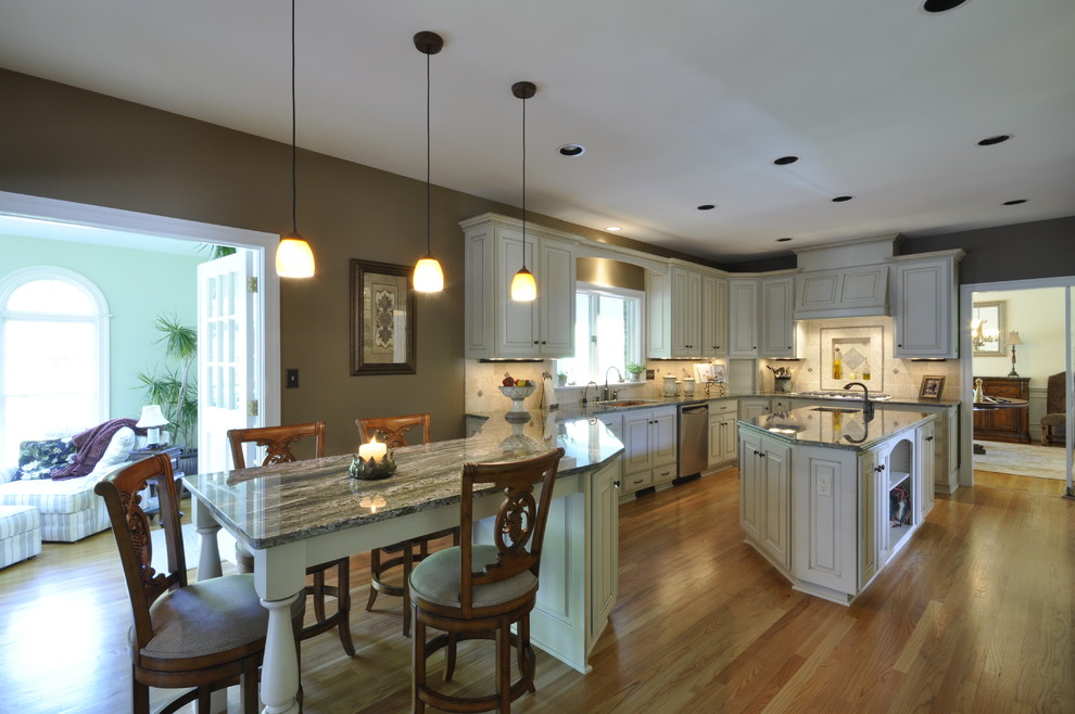 Traditional White Kitchen with Island and Integrated Table - Traditional - DC Metro - by MJA ...