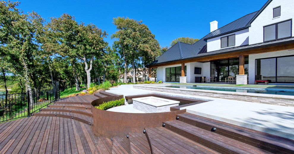 Waterfront deck with pool featuring Rustic Walnut composite decking ...