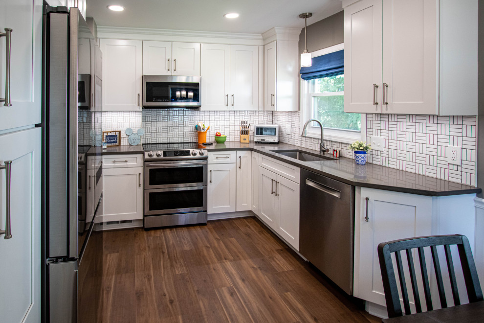 White Kitchen with White Tile Backsplash and Quartz Countertop ...