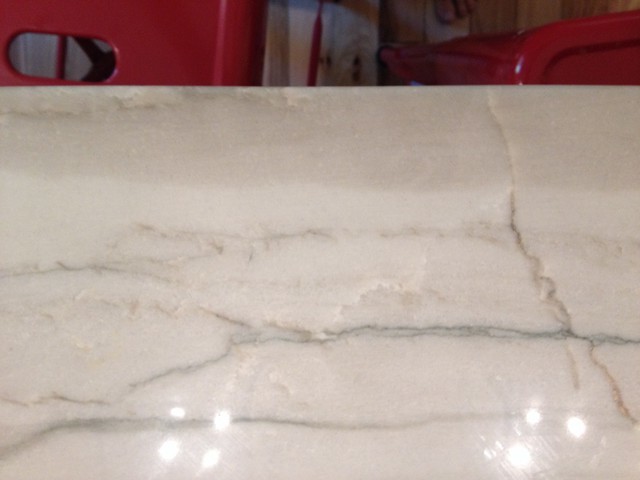 Water stains on white quartzite!