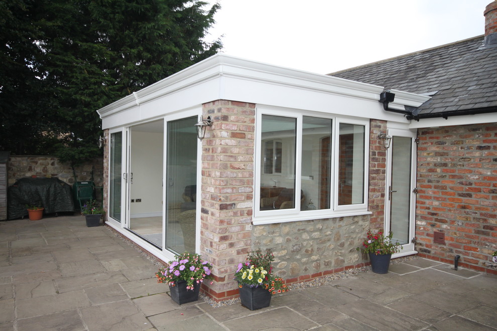 Modern orangery with sliding doors - Thornton Watlass - Modern - Other ...