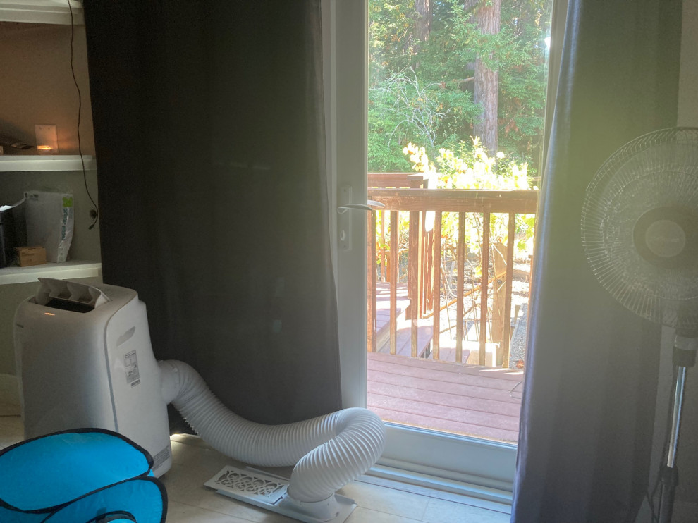 Venting portable AC unit through door.