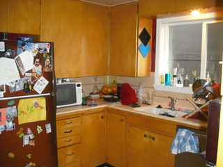 Fix a chopped up kitchen space into a dream kitchen for a family.