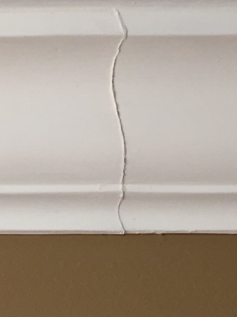 How can I fix visible joints on long sections of crown molding?