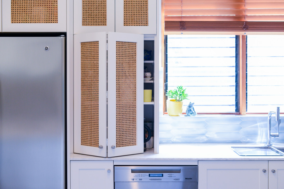 Coastal Kitchen with Bi-fold Rattan Door Inserts - Beach Style ...