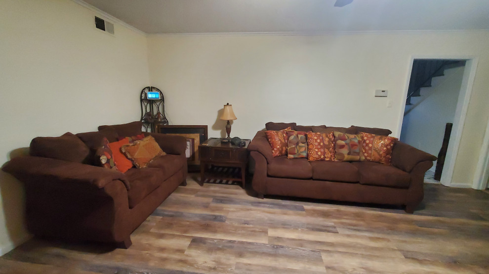 How to decorate my den with a large wall behind an off-centered couch ...