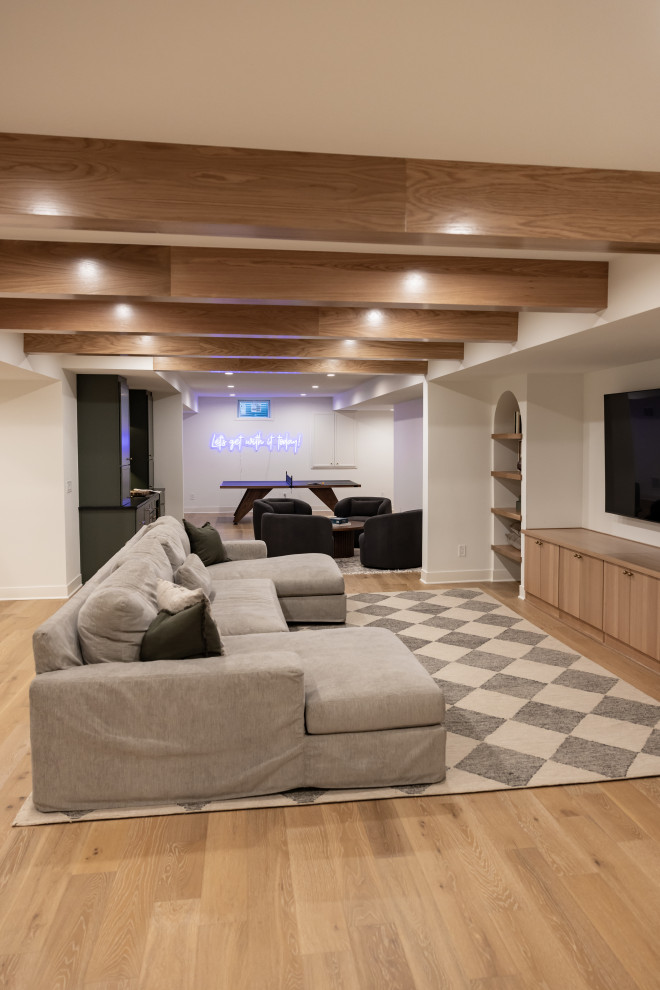 Modern Cozy Basement Remodel with Kings Buff Oak Flooring - Modern ...