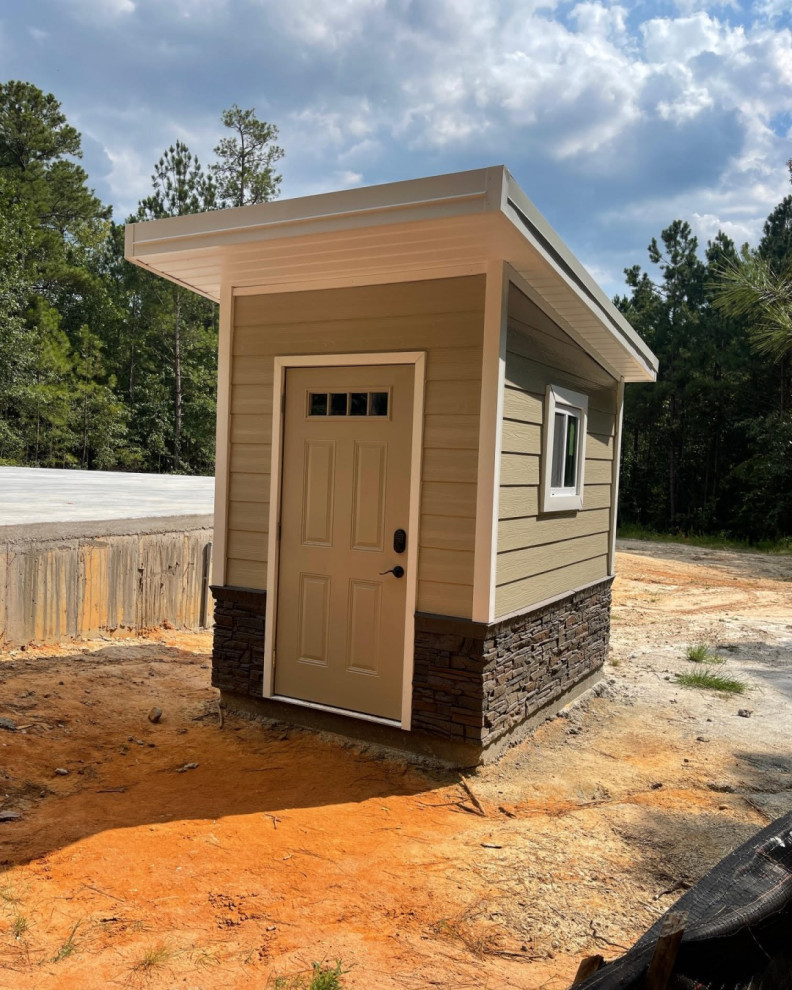 Coffee Stacked Stone Well House Wainscoting - Exterior - Denver - by ...