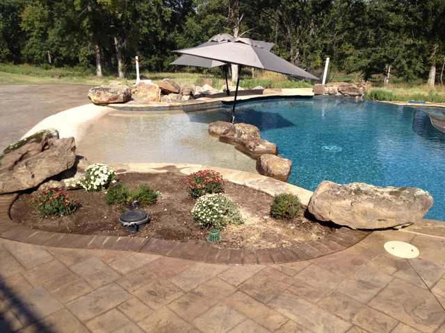 Beach entry, planter, accent boulders, two tone pool interior, swim up ...