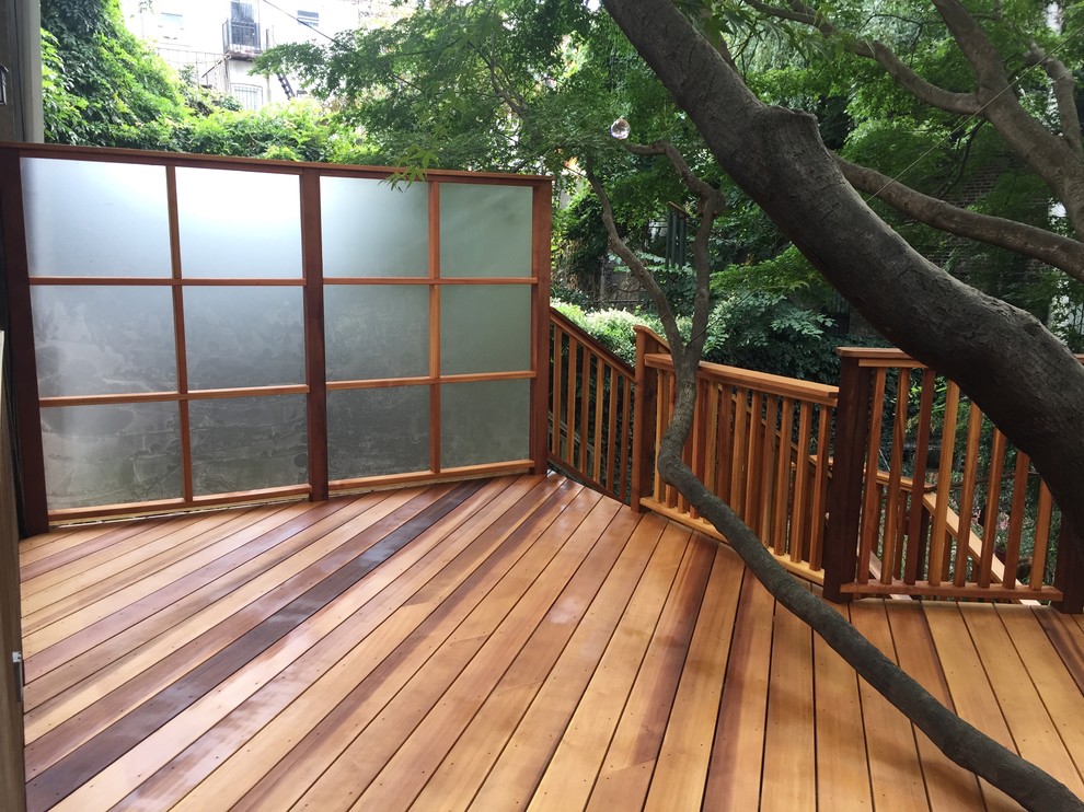 clear cedar deck with plexiglass fence for privacy - New York - by Dion ...