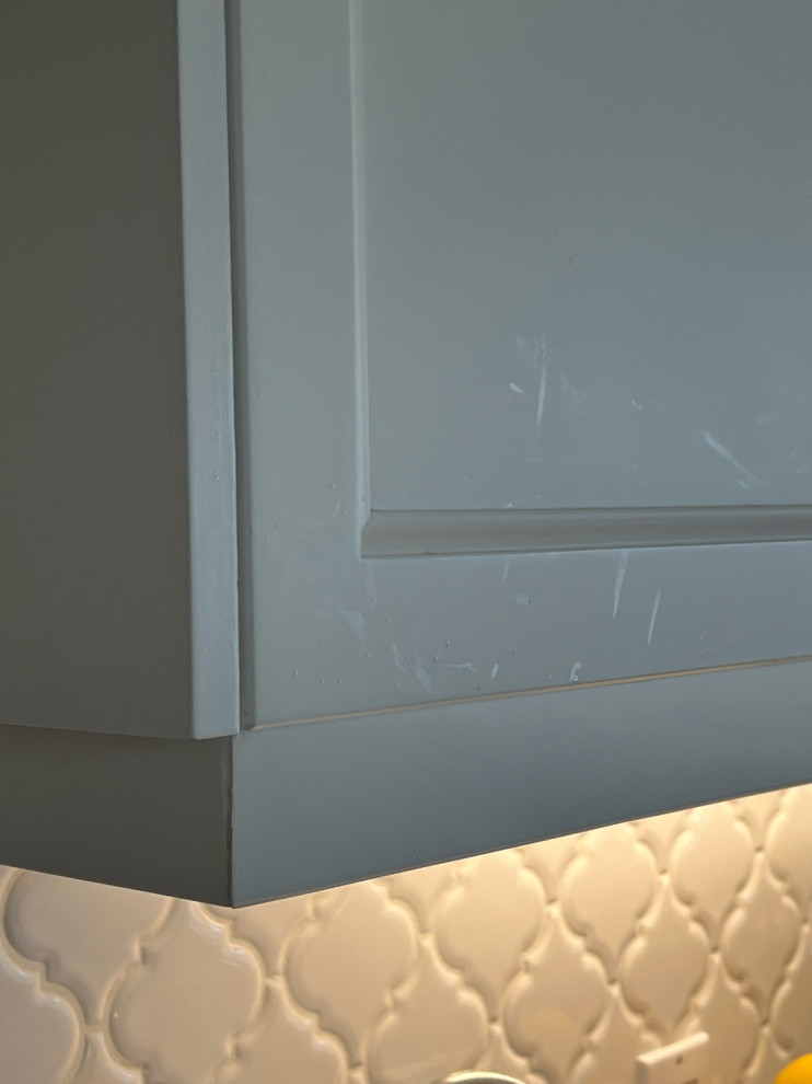 shiny marks on white cupboards