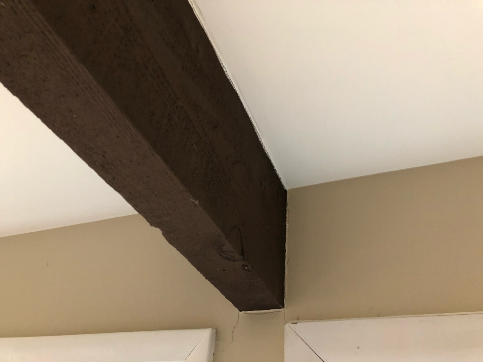 How to improve the look of dark brown exposed beams?