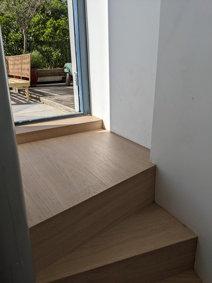 Oak Spiral Staircase with Seamless Waterfall Cladding | Maida Vale W9 ...