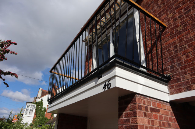 Front exterior - garage door, hand rail, and railing in West Wimbledon ...