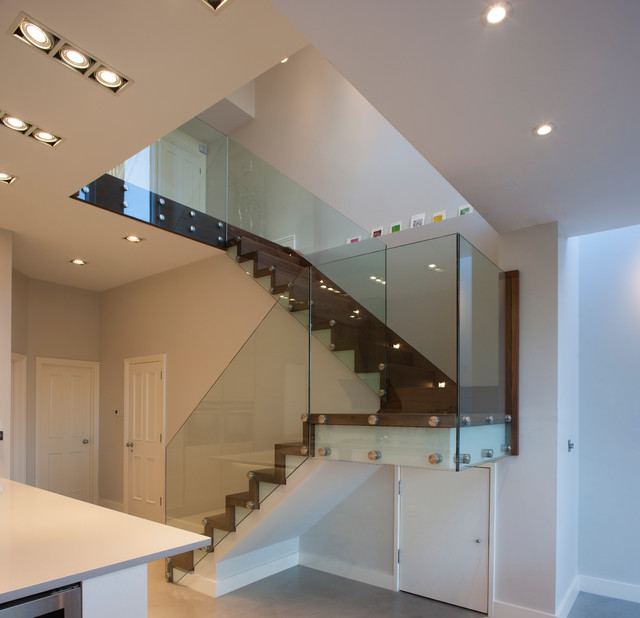 Small space enlarged - lowered basement /double height void entrance ...