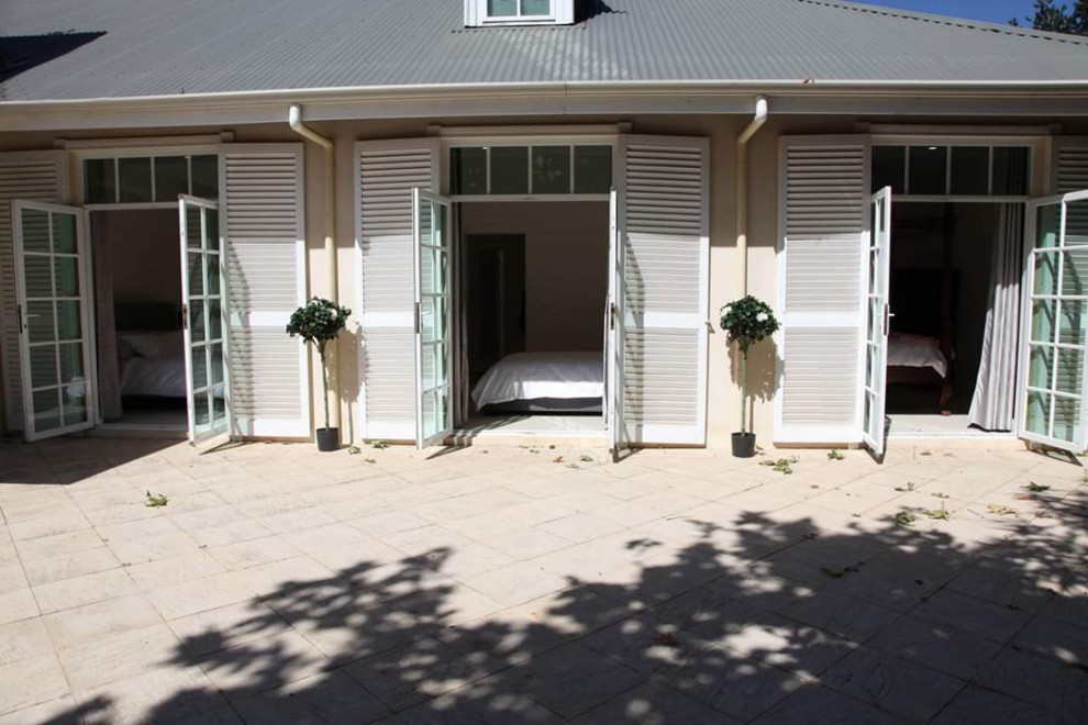 Creating a master bedroom with a large wir by combining 2 bedrooms ...