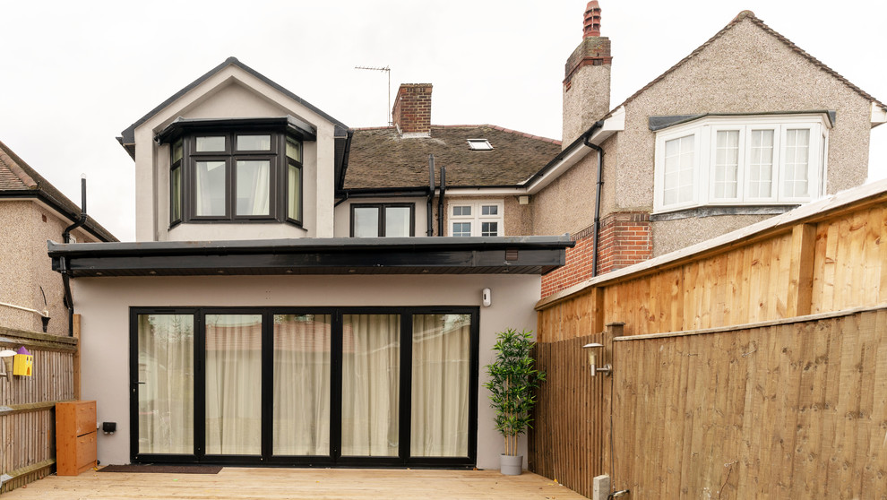 Hounslow House Extension- Contemporary facade set in the pebble-dash ...