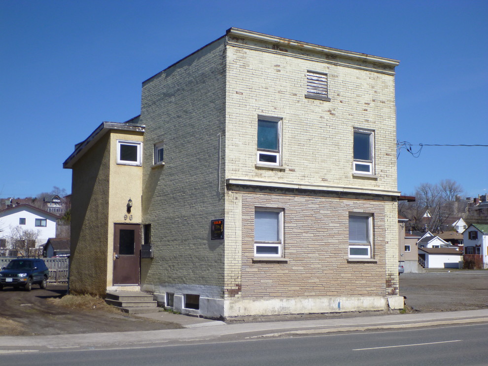 I have an extraordinarily ugly square building. Please help.