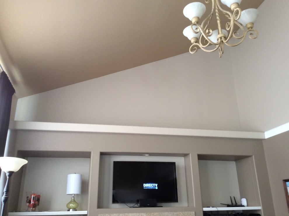 How can I decorate a large ledge above built in shelves?