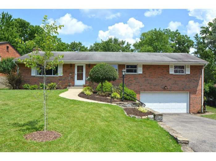 Color of roof and gutters for red brick mid century ranch?