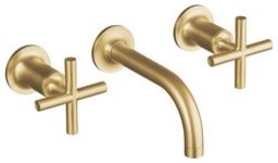Brushed gold or brass finish taps