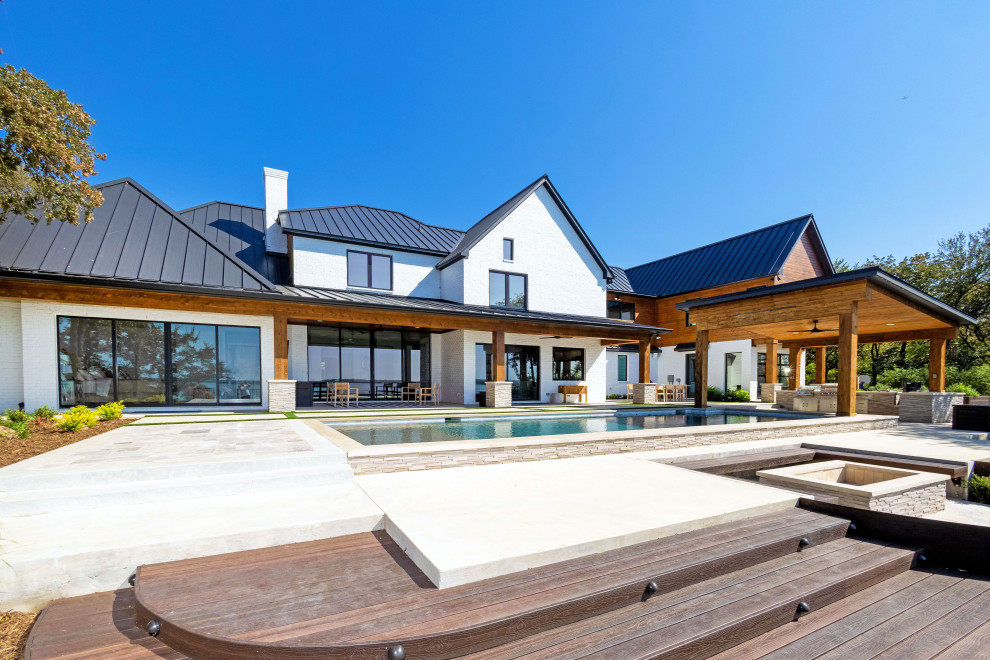 Waterfront deck with pool featuring Rustic Walnut composite decking ...