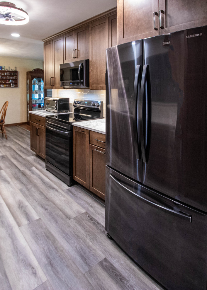 French Roast Kitchen Cabinetry with Eternia Quartz Countertop ...